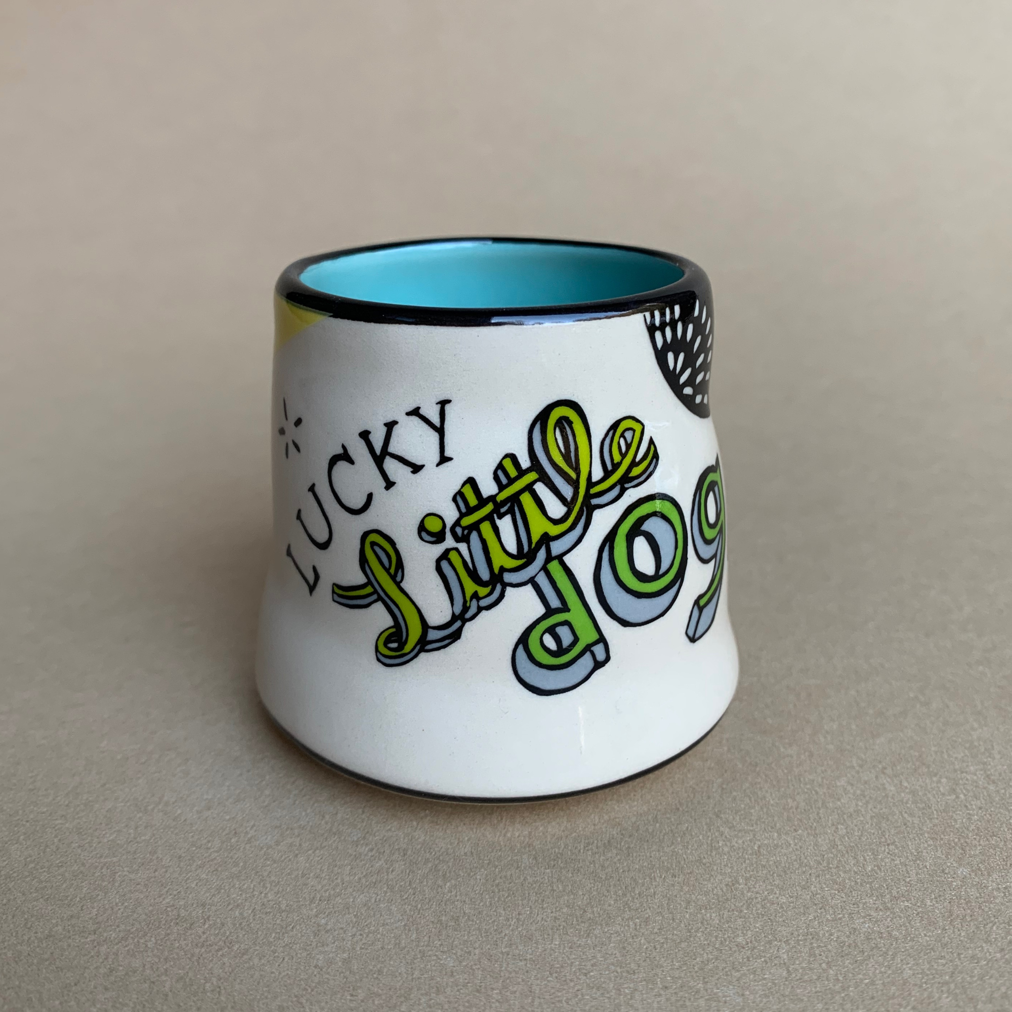 dog pick cup